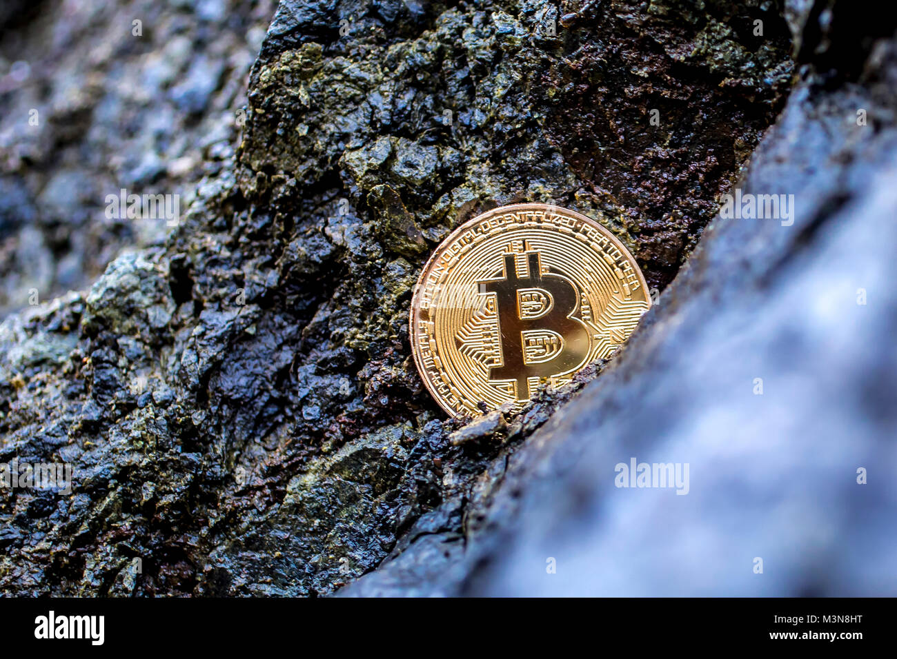 bitcoin on the stone background Stock Photo - Alamy