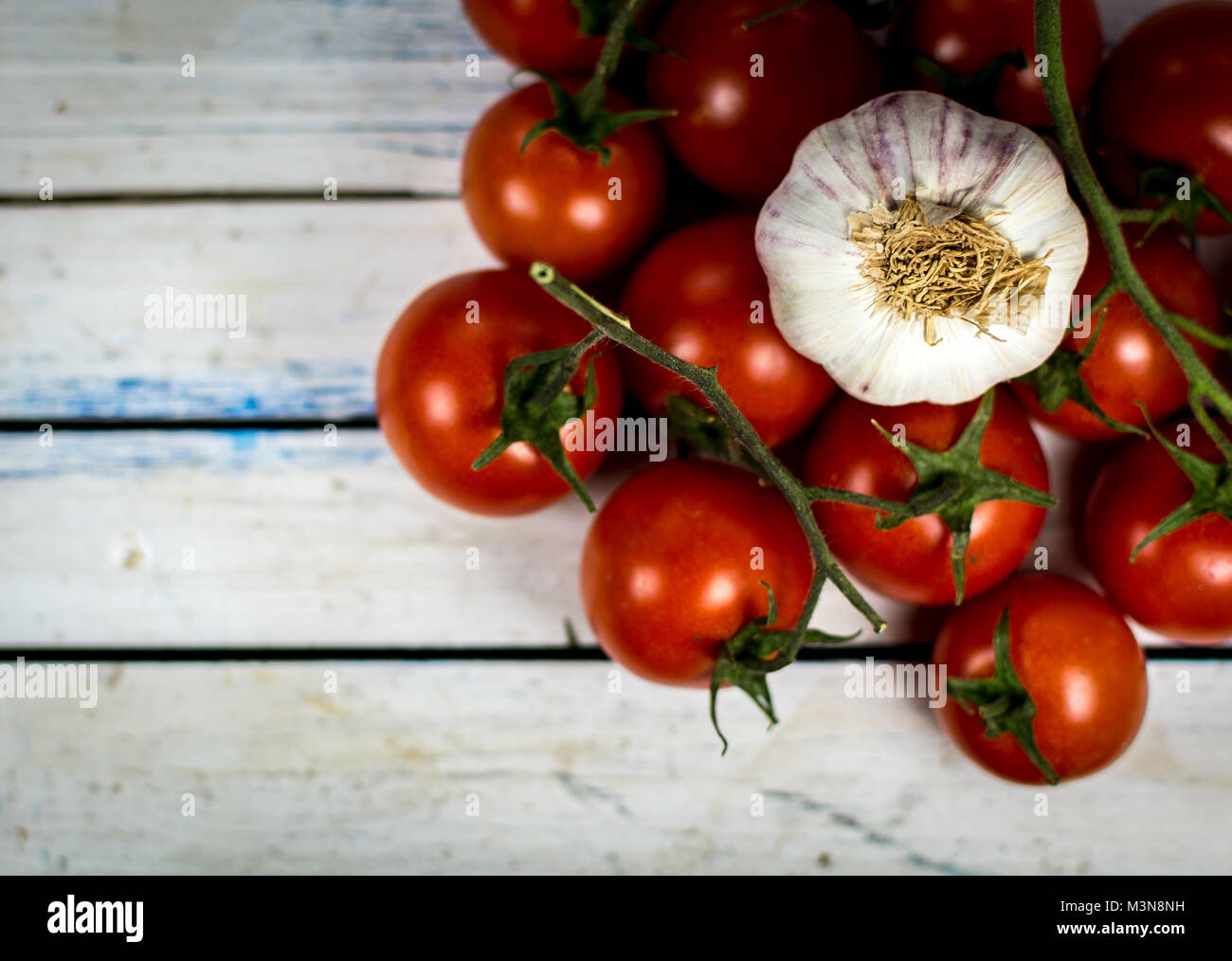 Cherry vine tomatoes isolated on white hi-res stock photography and ...