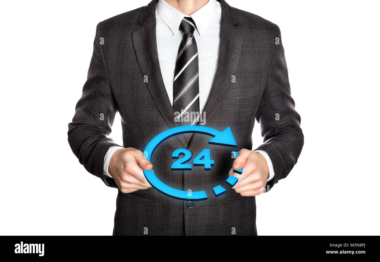 Businessman holding an 24h-symbol Stock Photo - Alamy