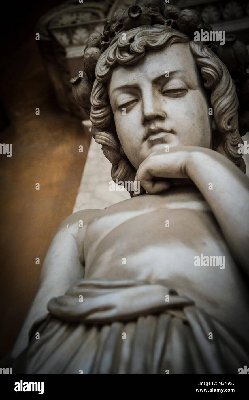 Worried angel immersed in a deep thought Stock Photo - Alamy