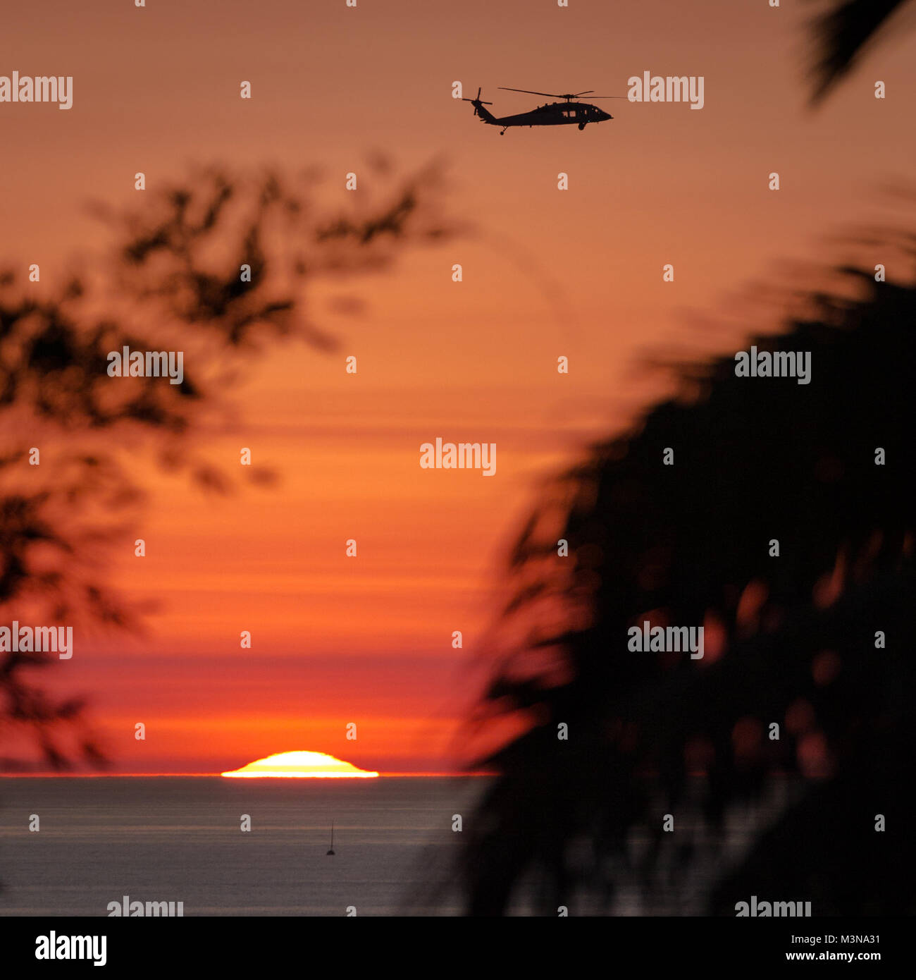military helicopter at sunset Stock Photo - Alamy