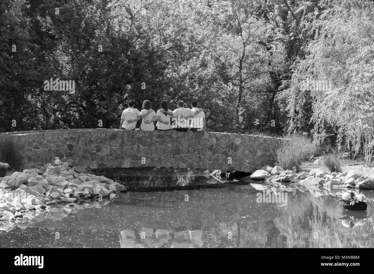 Woman sitting on bridge summer hi-res stock photography and images - Alamy
