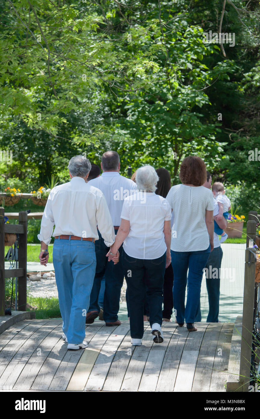 Large Family Walking Together Through a Park Stock Photo - Alamy