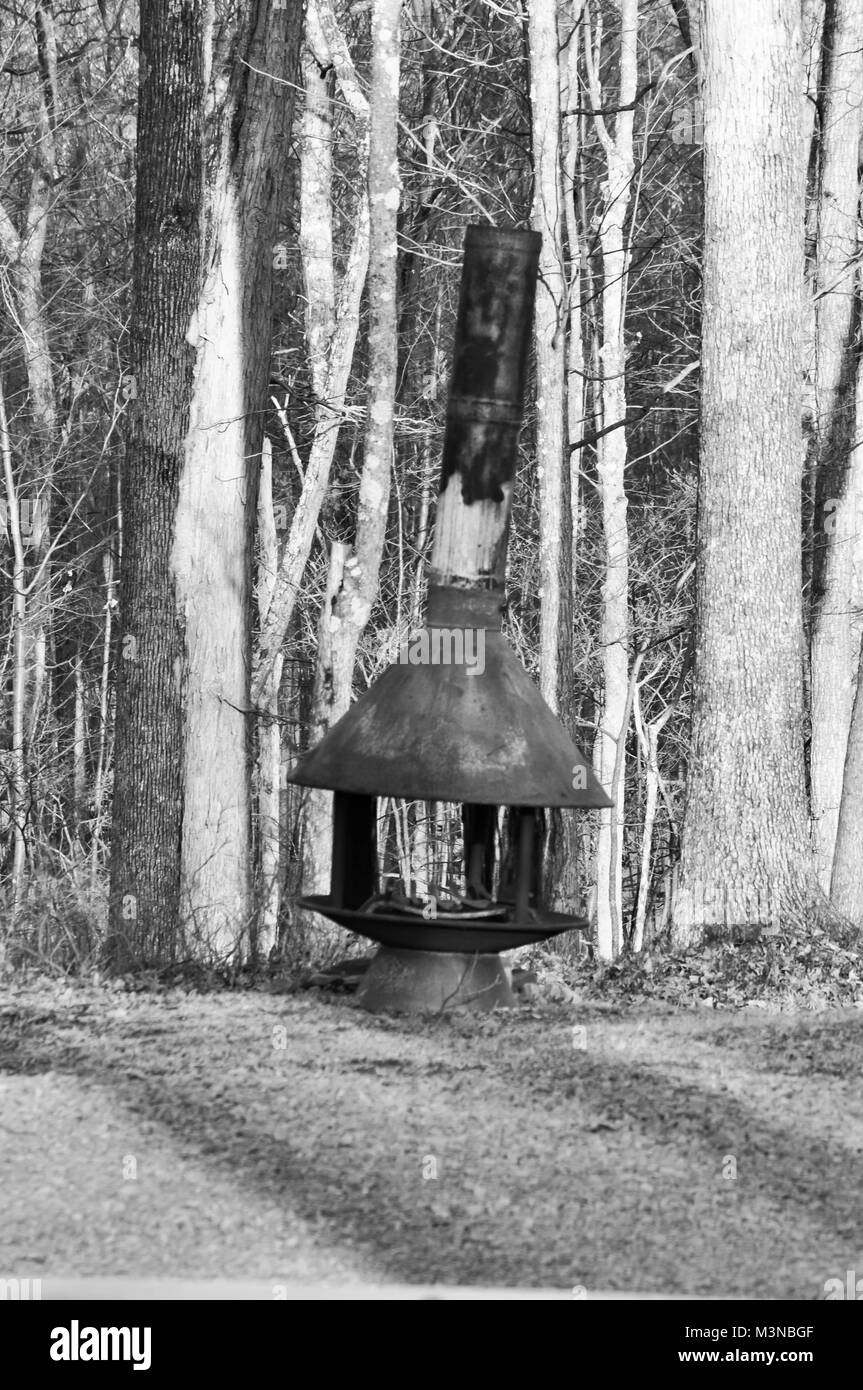 Broken Firepit Stove in the Woods of Pennsylvania Stock Photo - Alamy