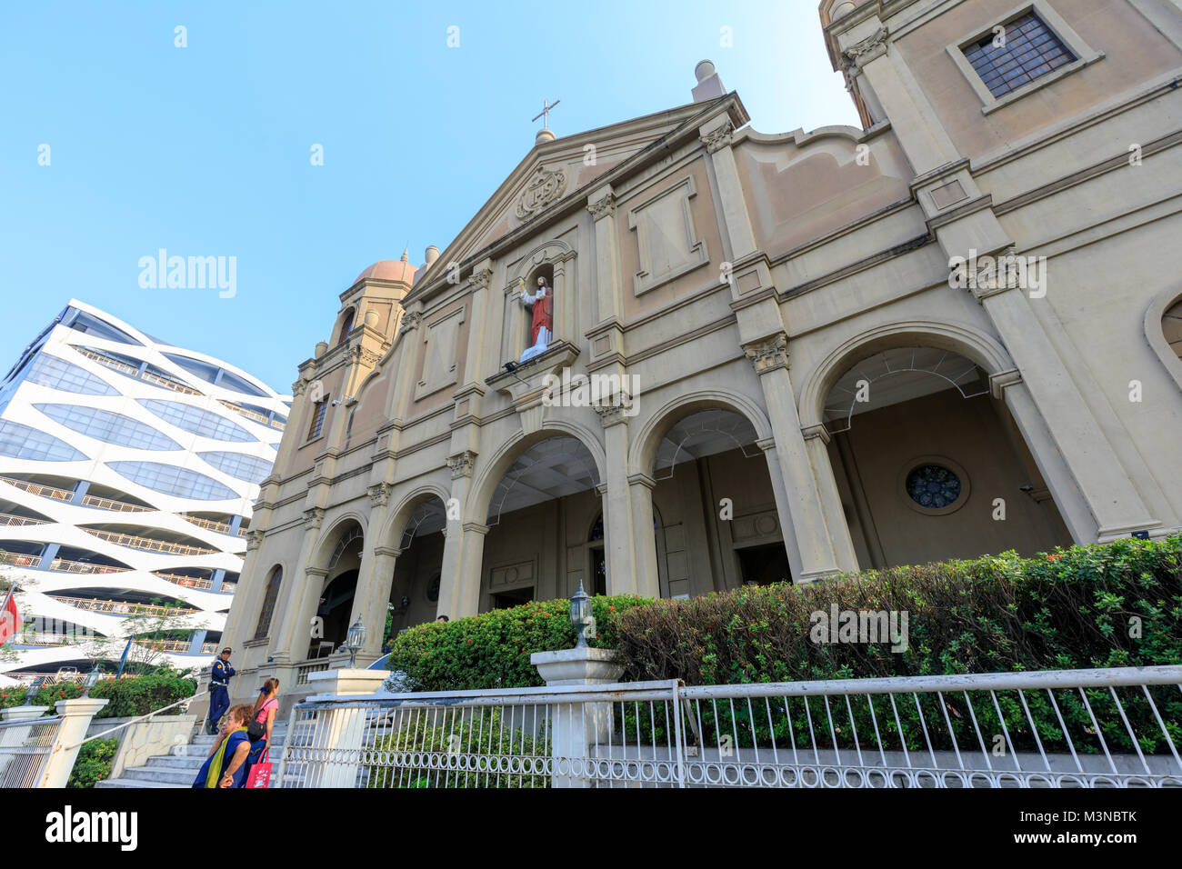 Manila, Philippines - Feb 10, 2018 : Facade of catholic churches beside ...