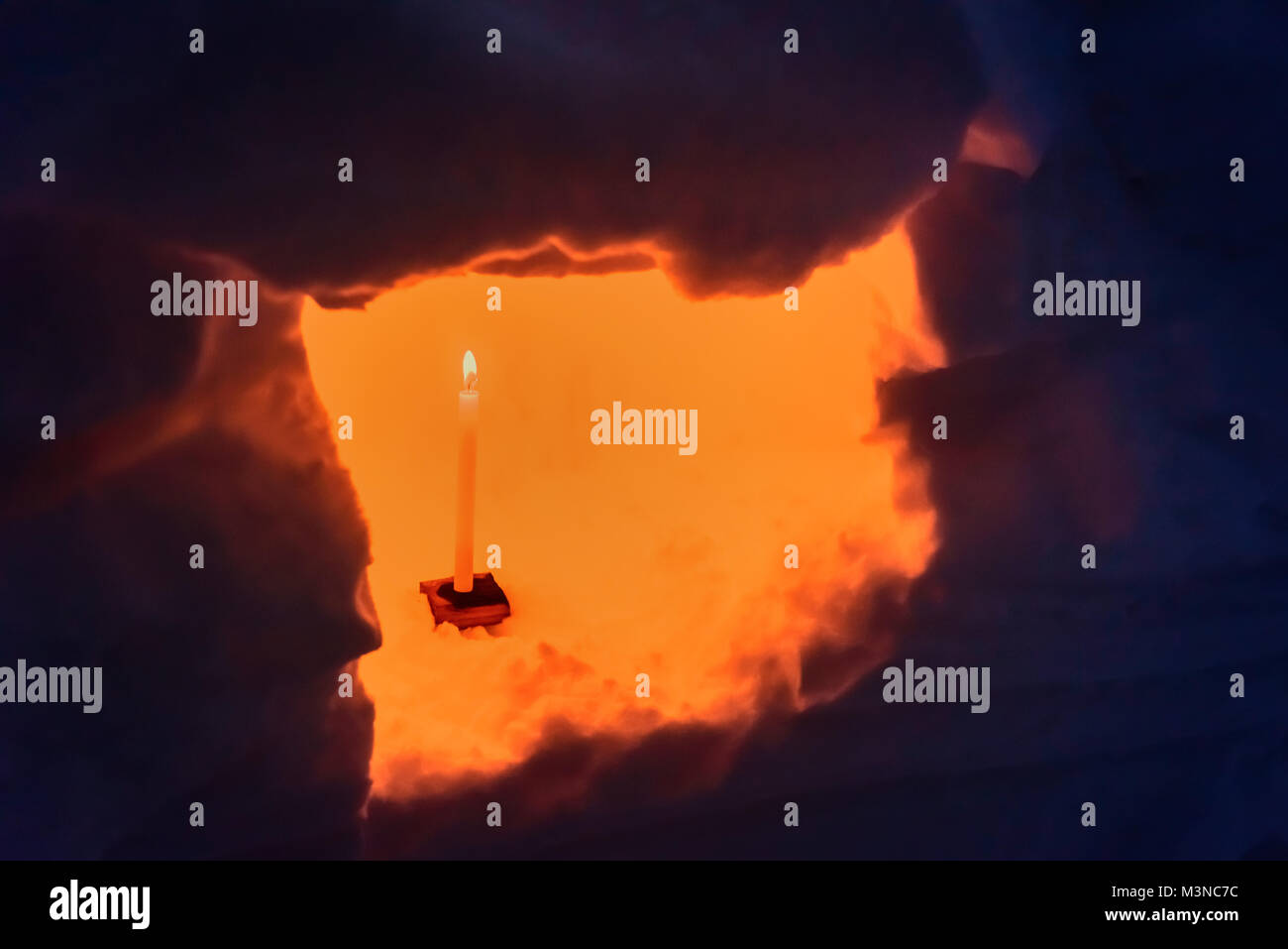 The snow path is lit up by candles in Shirakawago, Japan Stock Photo ...