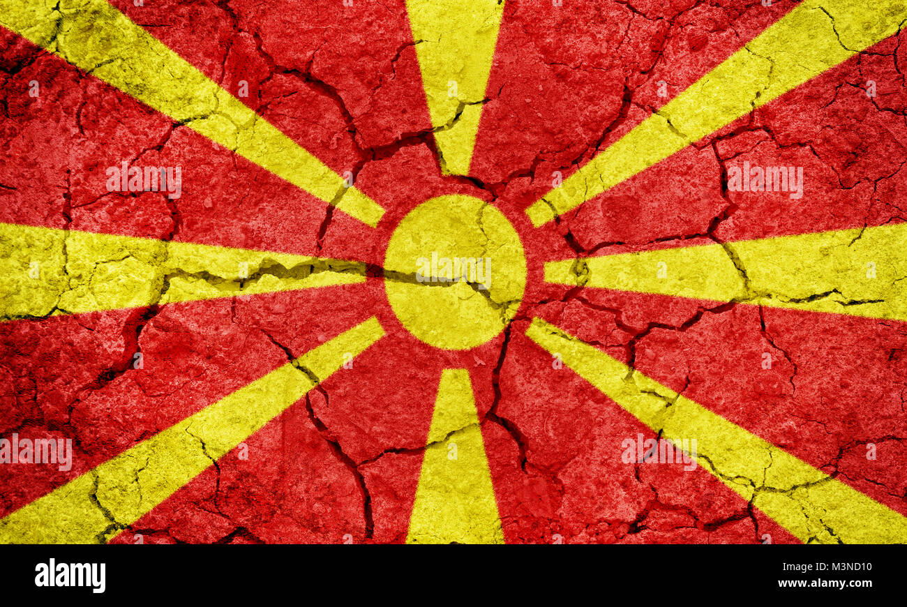 Republic of Macedonia flag on dry earth ground texture background Stock ...