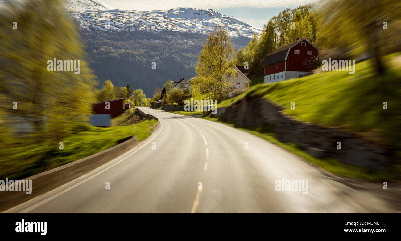 Country road in Norway at high speed Stock Photo - Alamy