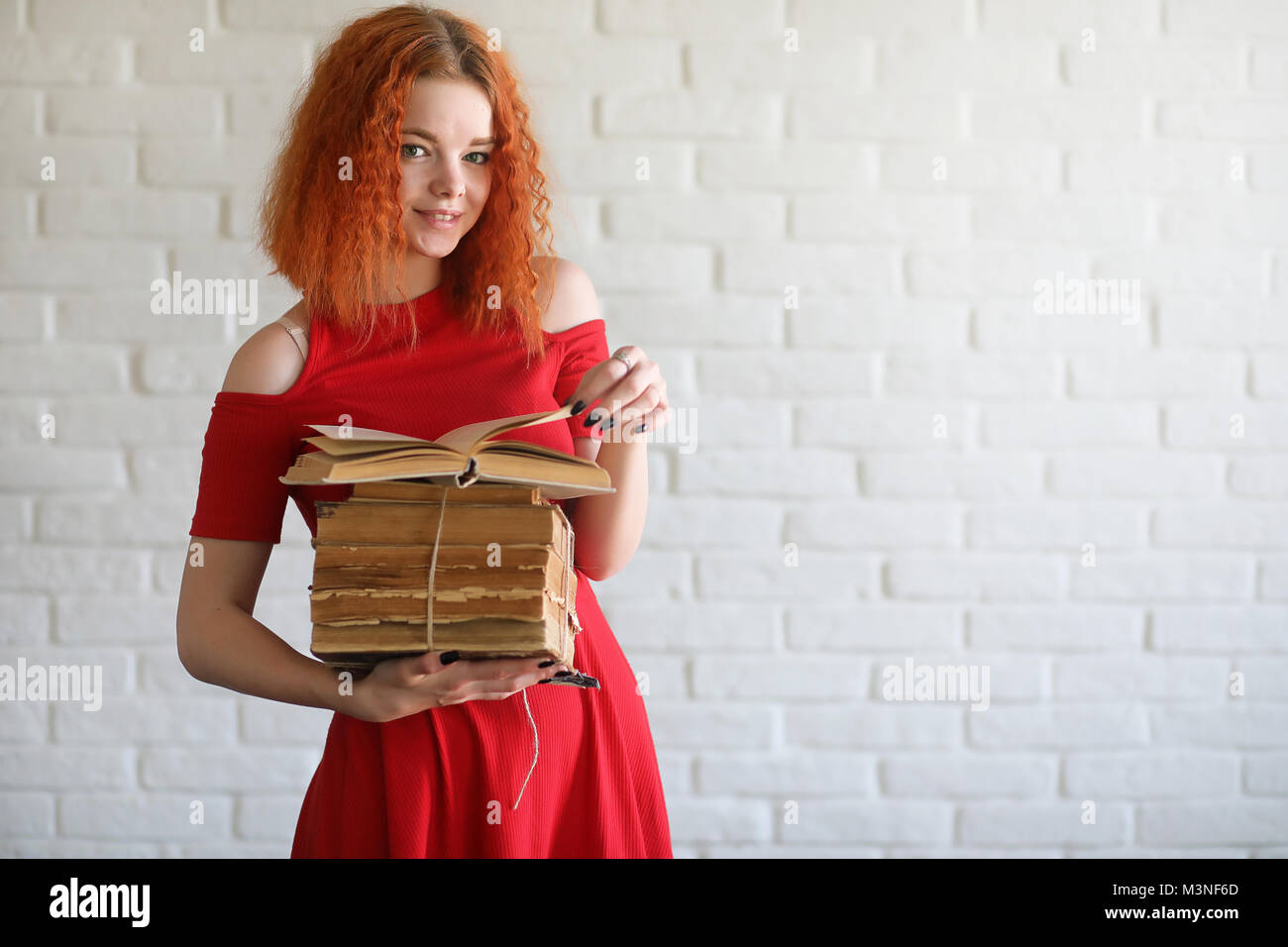 Red-haired girl student Stock Photo - Alamy