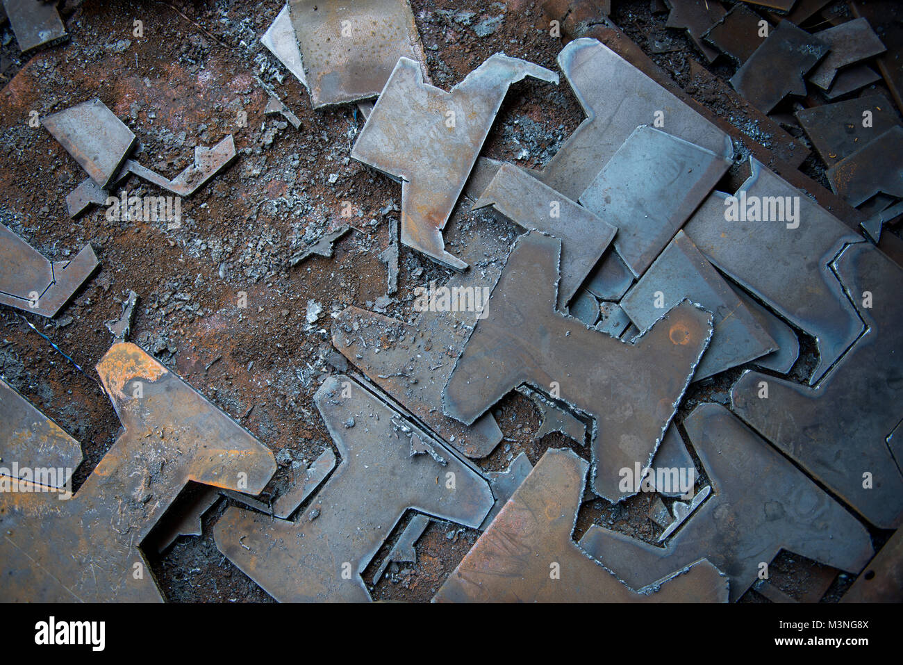 scrap metal on the floor Stock Photo - Alamy