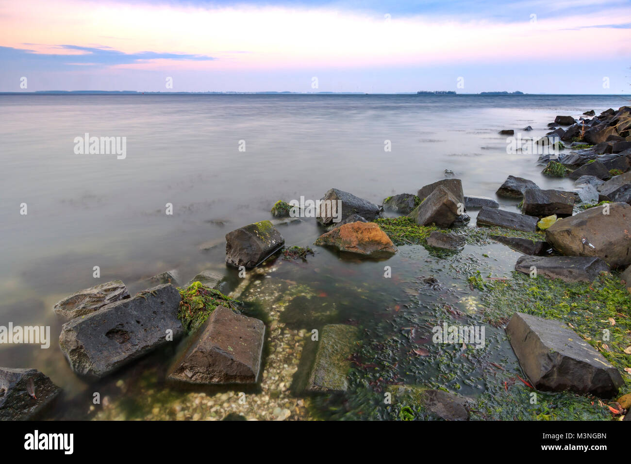 Rocks on the zeeland coast of the netherlands hi-res stock photography ...