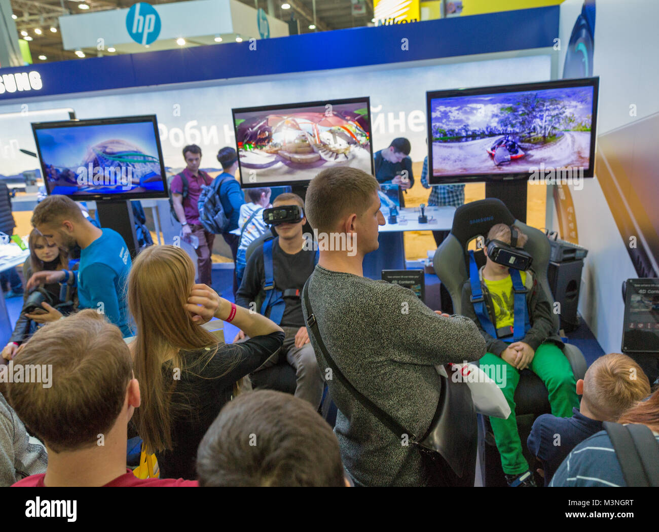 KIEV, UKRAINE - OCTOBER 07, 2017: Young people use Samsung virtual ...