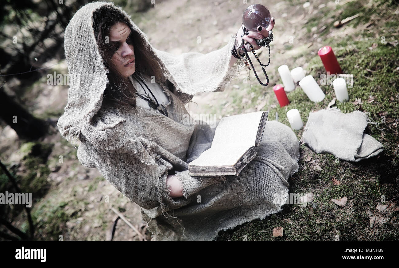 Fairy magician. A sorcerer with a glass sphere, a magical spell Stock ...