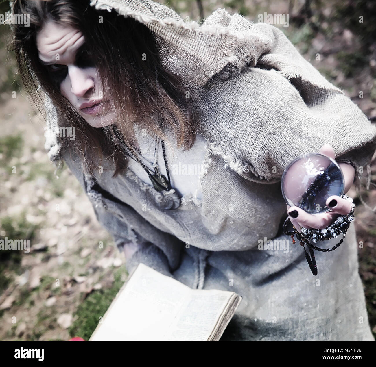 Fairy magician. A sorcerer with a glass sphere, a magical spell Stock ...