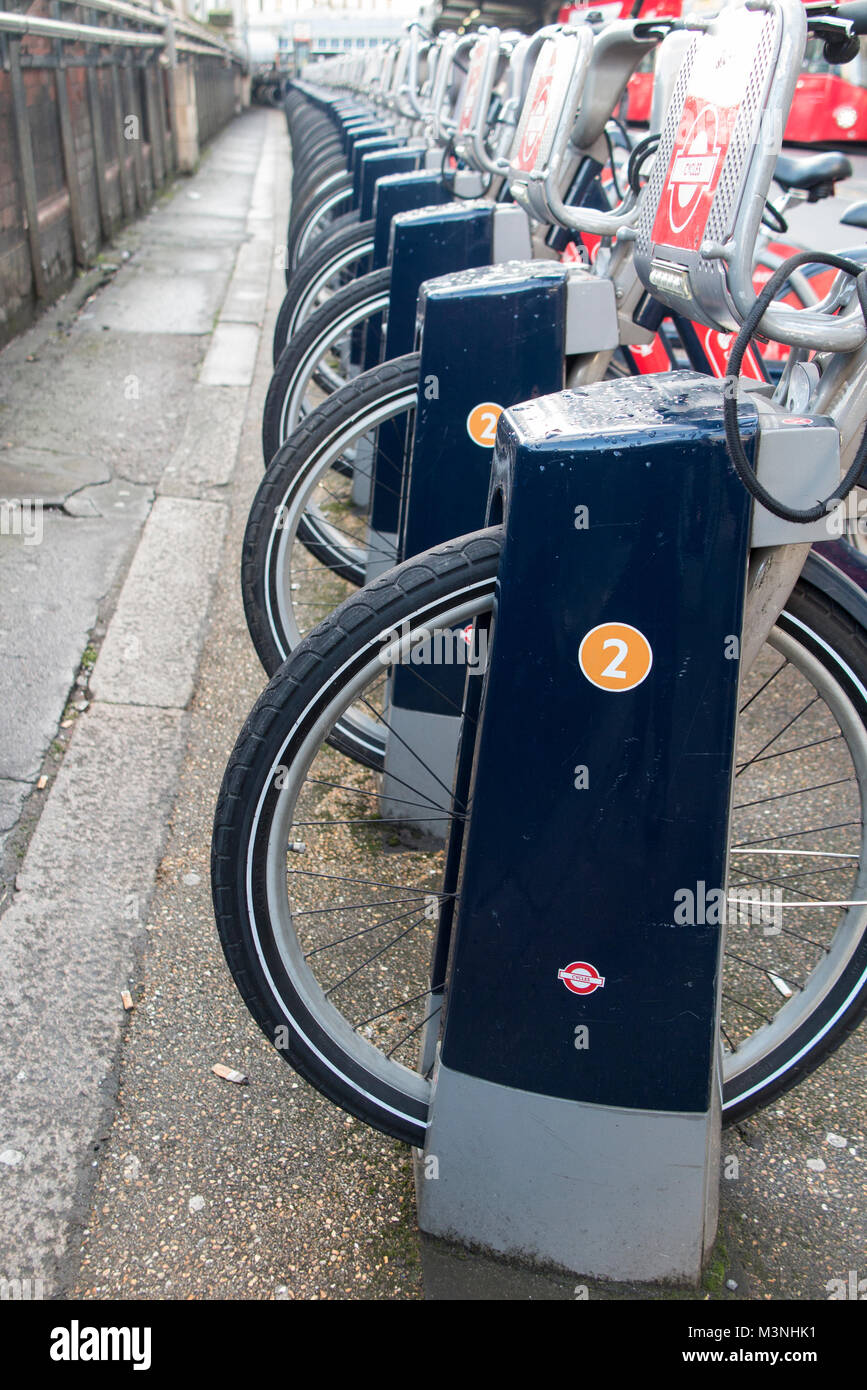 Many, many bike wheels lined up in London Stock Photo - Alamy