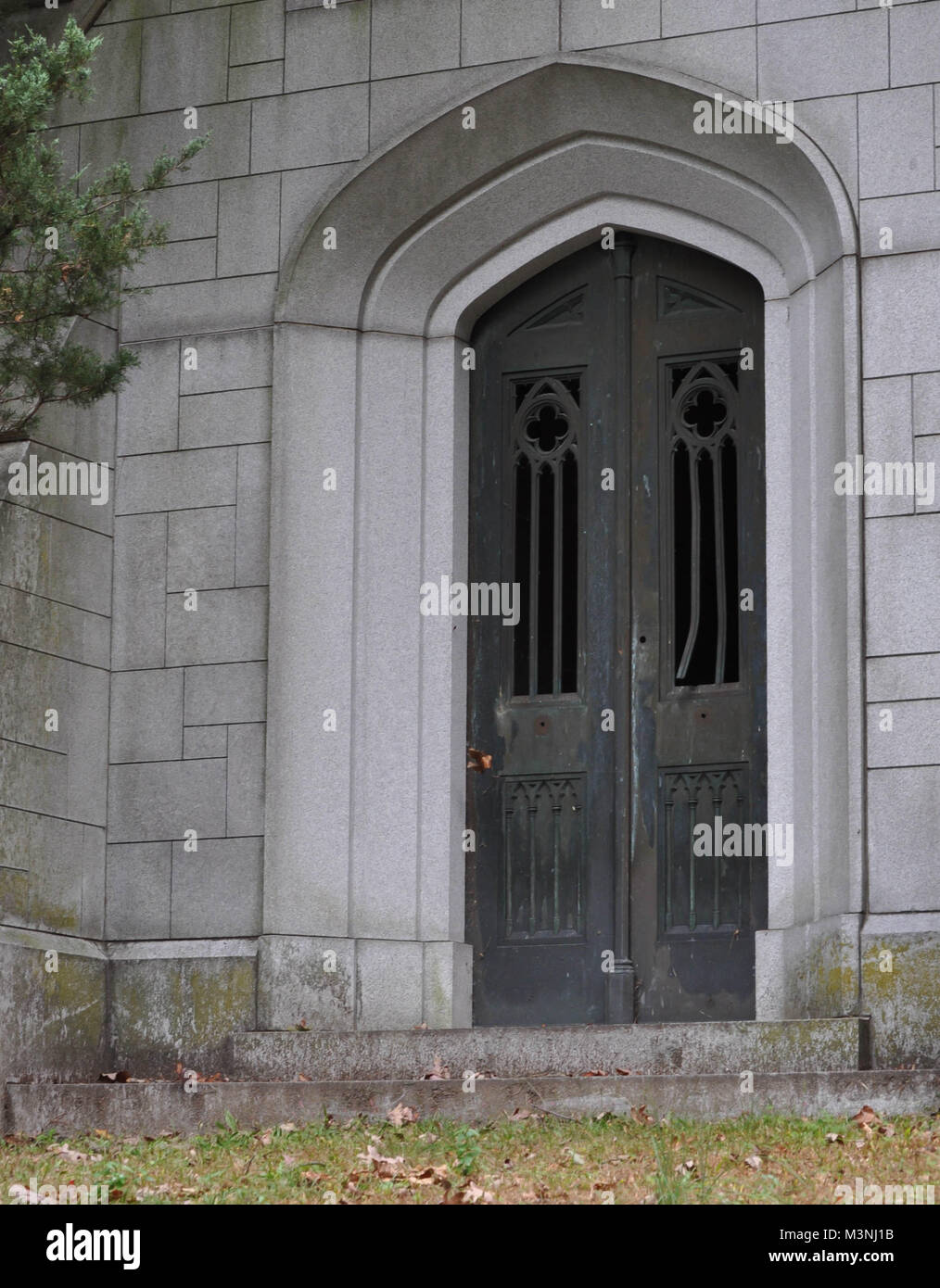 Abandoned Mausoleum Doors in a Cemetery Stock Photo - Alamy