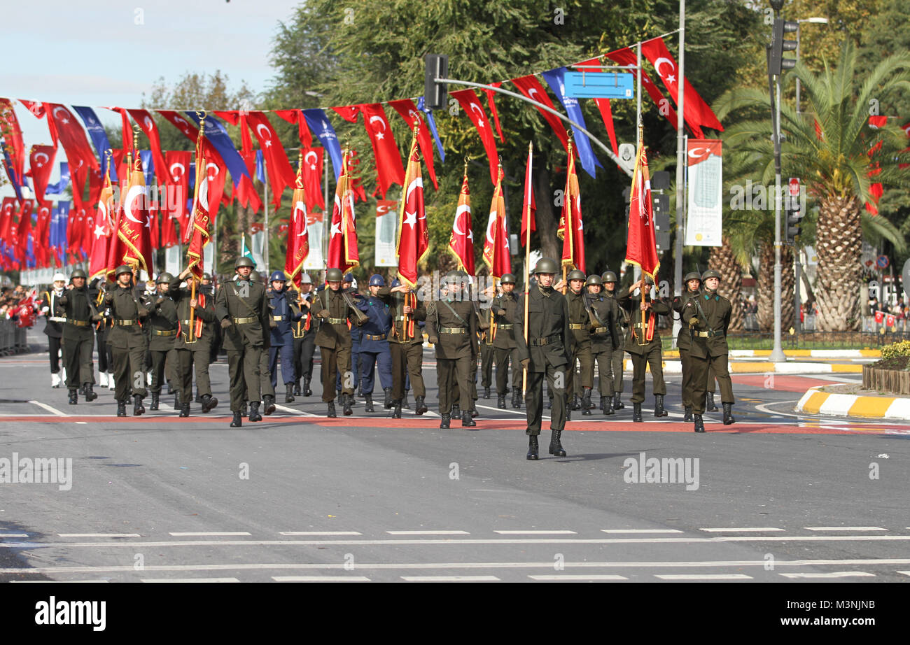 ISTANBUL, TURKEY - OCTOBER 29, 2017: Soldiers march with flags during ...
