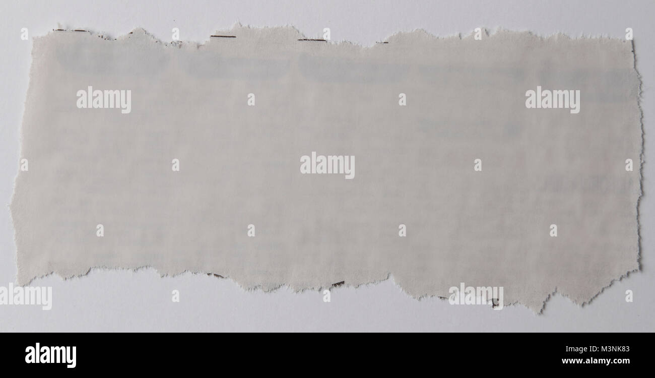 Piece of torn paper on plain background Stock Photo - Alamy