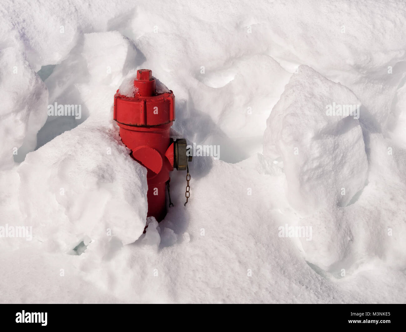 Red fire hydrant in deep snow. Unbranded Stock Photo - Alamy
