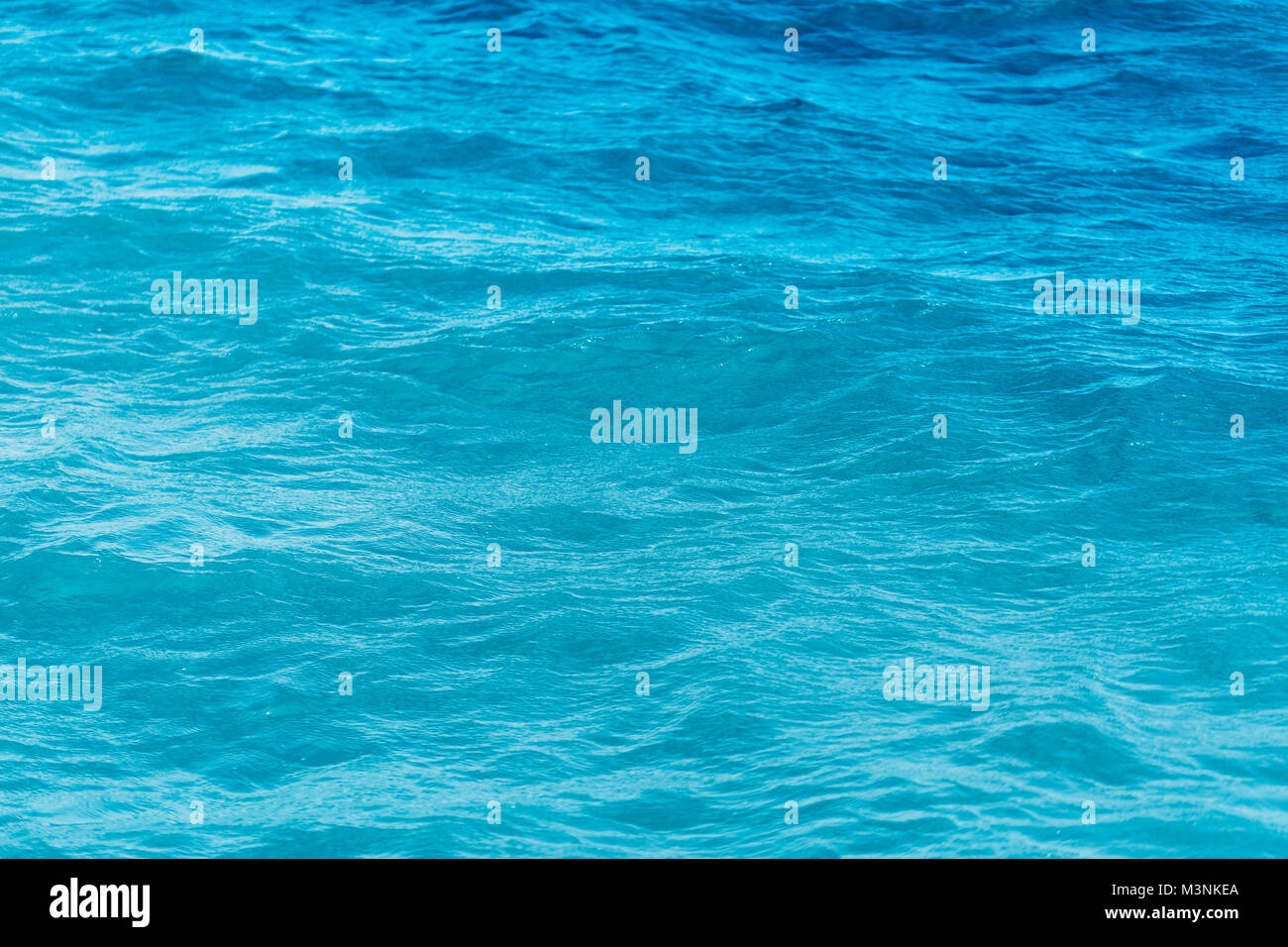 Bright Blue ocean with smooth wave background Stock Photo - Alamy