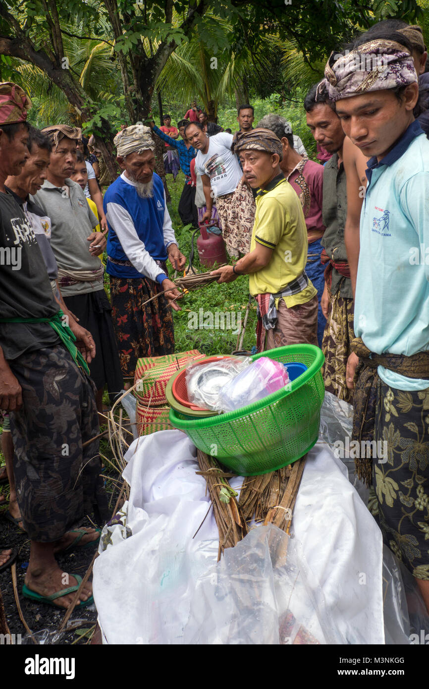 Balinese people bury their dead in a traditional cremation ceremony ...