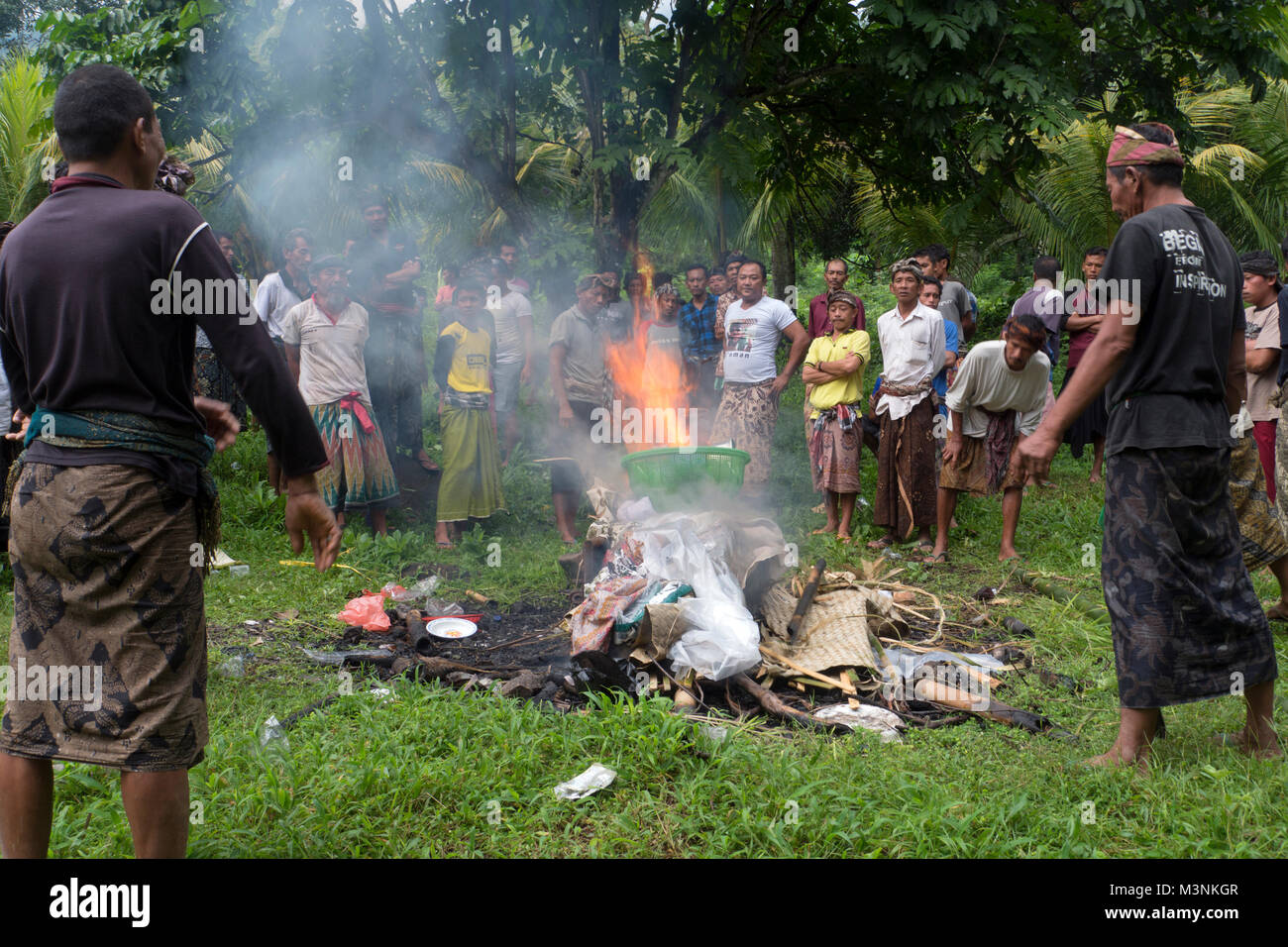 Balinese people bury their dead in a traditional cremation ceremony ...