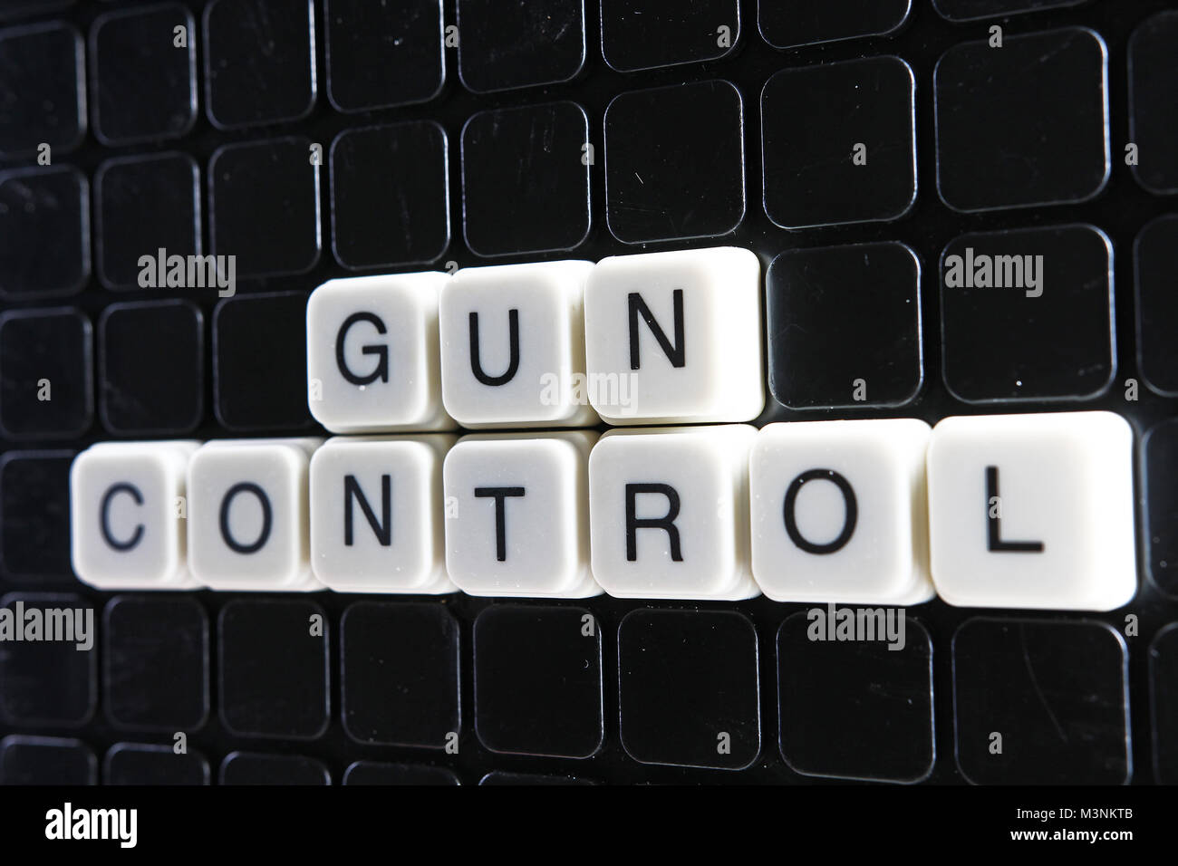 Gun control text word title caption label cover backdrop background ...