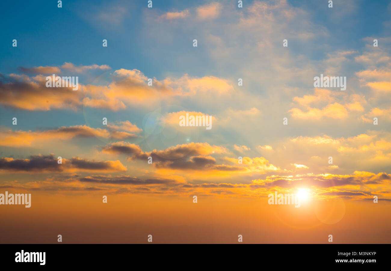 Morning Sun light shine with blue cloudy background Stock Photo - Alamy