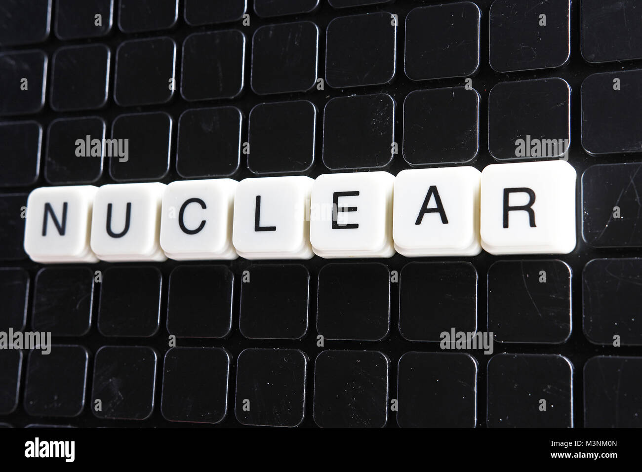 Nuclear text word title caption label cover backdrop background ...