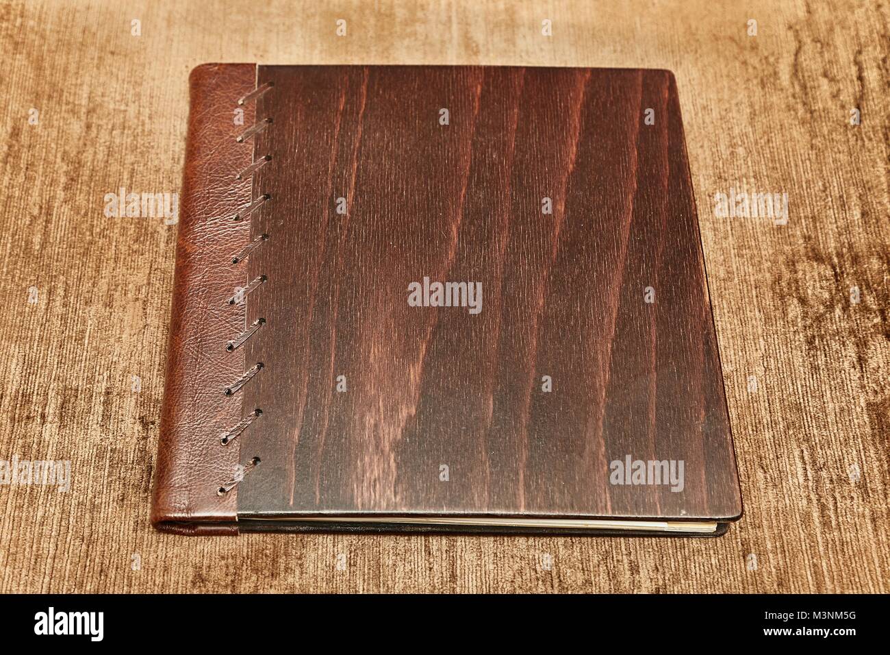 Book on a table Stock Photo - Alamy