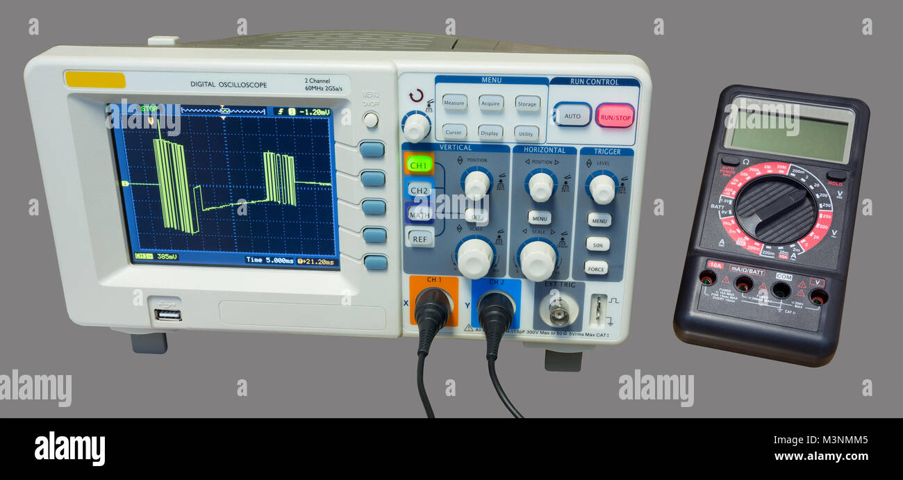Oscilloscope and multimeter. Measurement of data line signals. Display ...