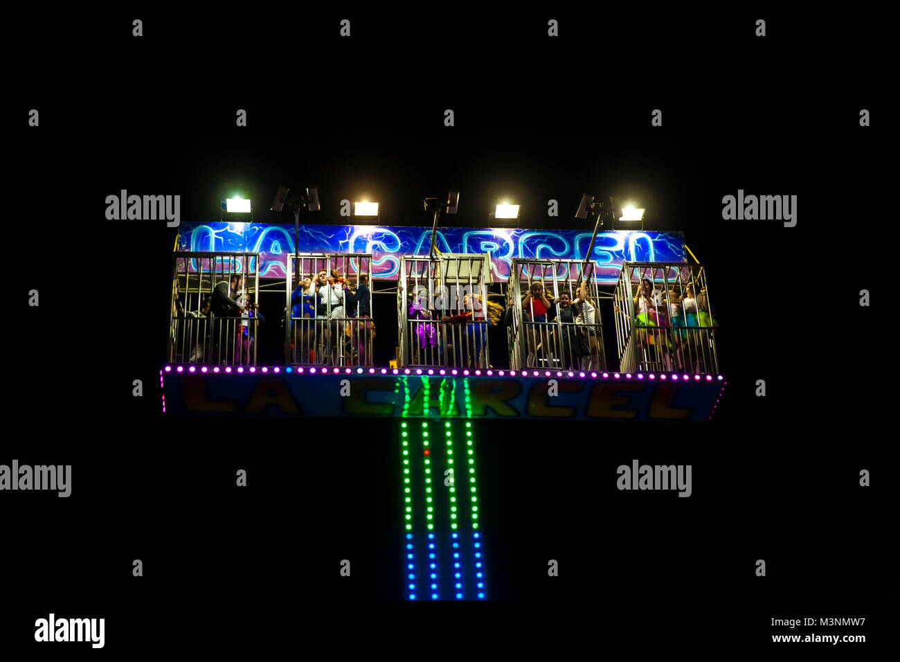 fairground attraction at night Stock Photo - Alamy