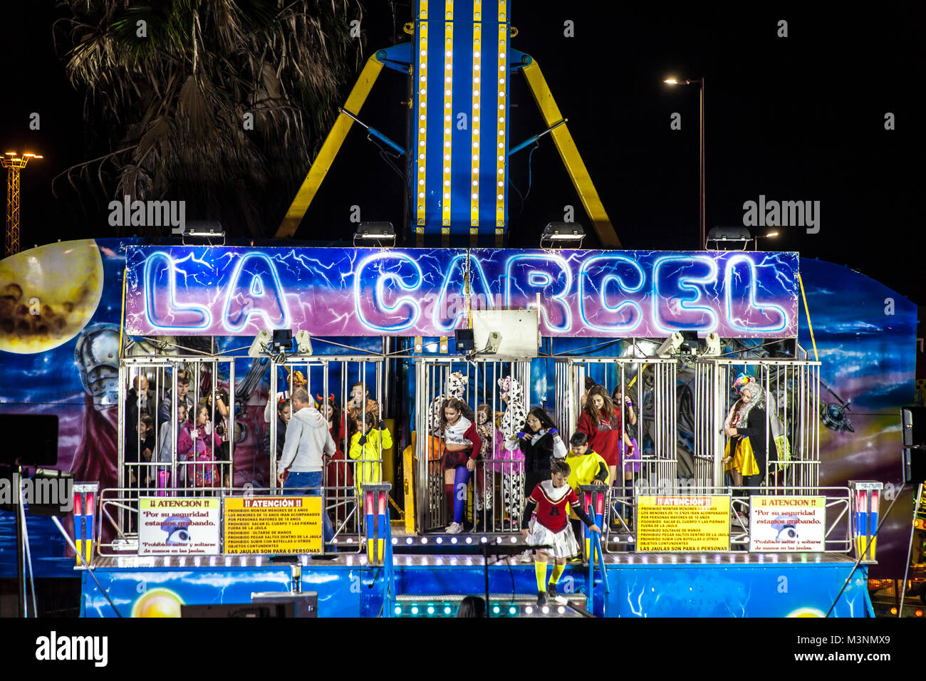 fairground attraction at night Stock Photo - Alamy
