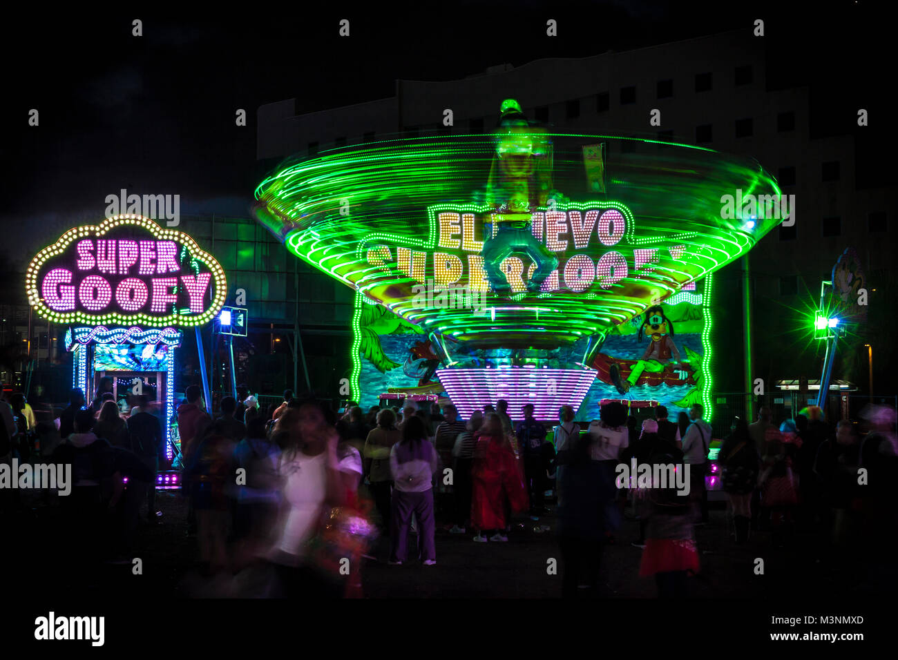 fairground attraction at night Stock Photo - Alamy