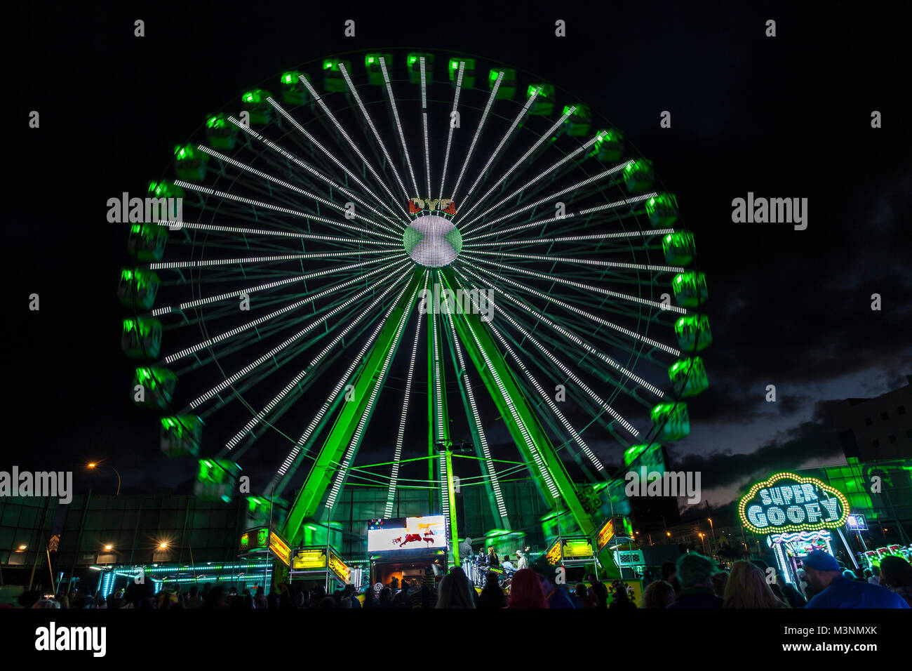 fairground attraction at night Stock Photo - Alamy