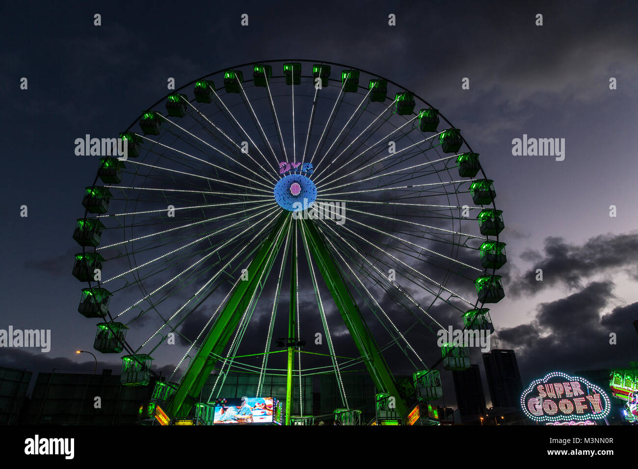 fairground attraction at night Stock Photo - Alamy