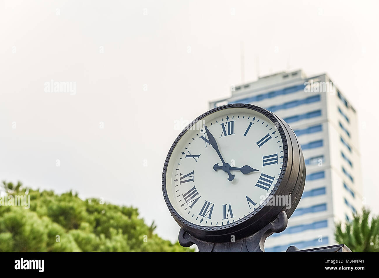 Outdoor antique pole clock hi-res stock photography and images - Alamy