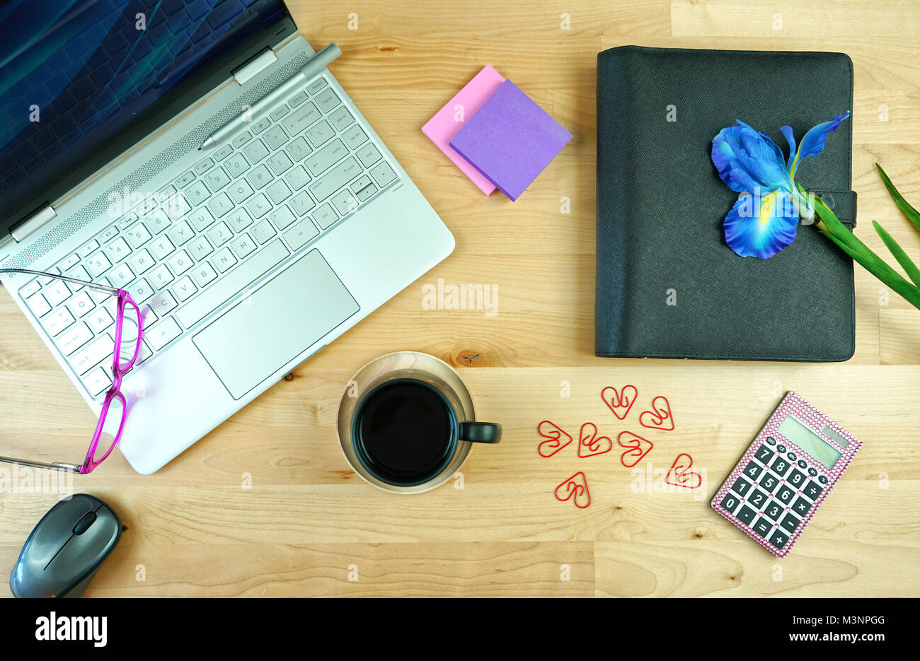 Office desk with modern touch screen pc, diary planner, and morning ...