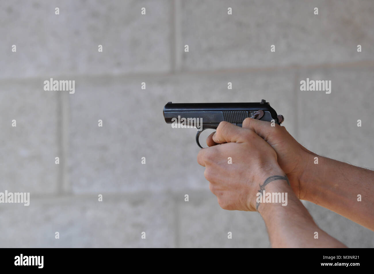 Aiming and Holding 1911 .45 Caliber Hand Gun Stock Photo - Alamy