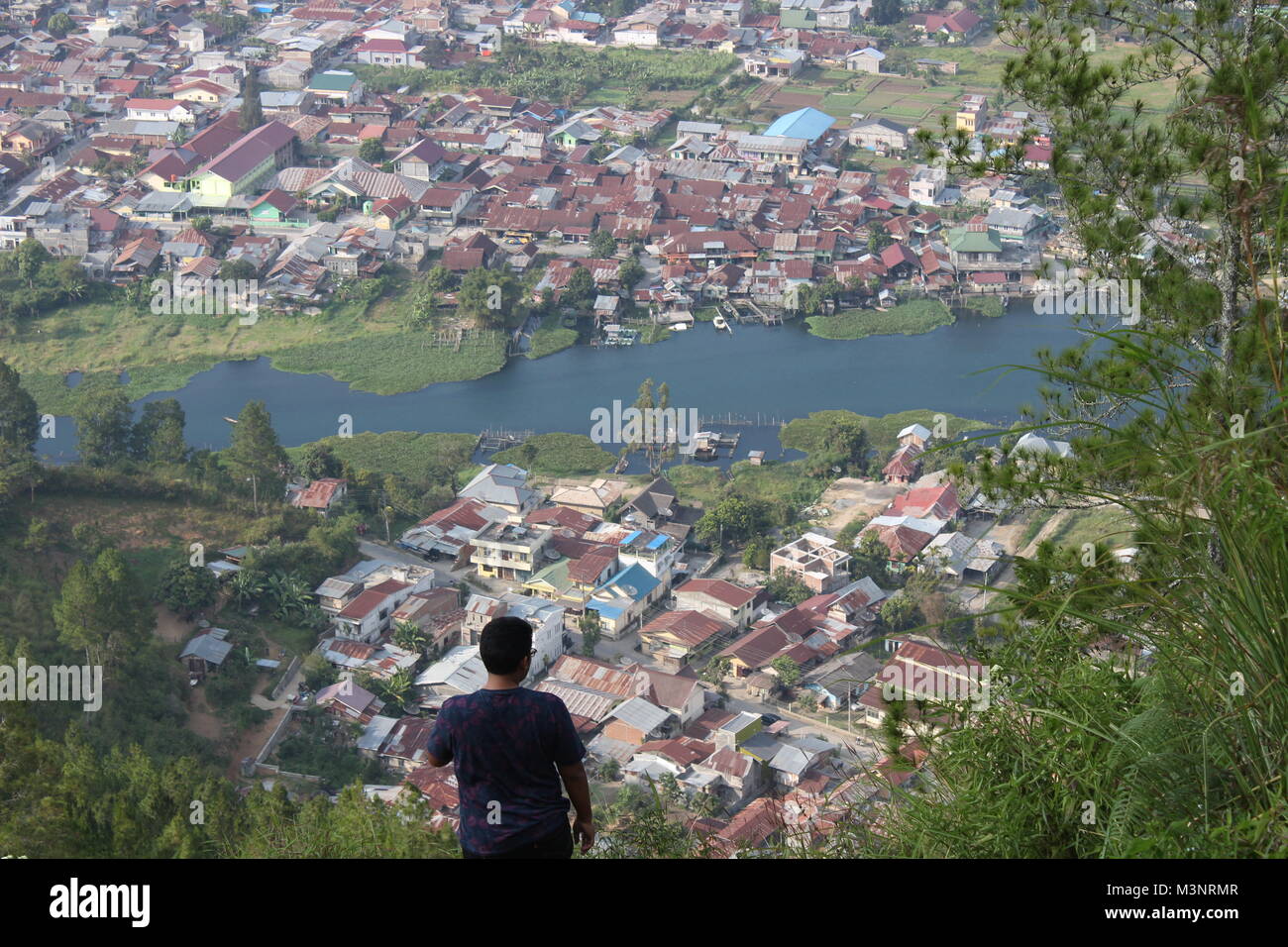 Takengon, Indonesia. 22nd Feb, 2015. Visitor is enjoying the view of ...