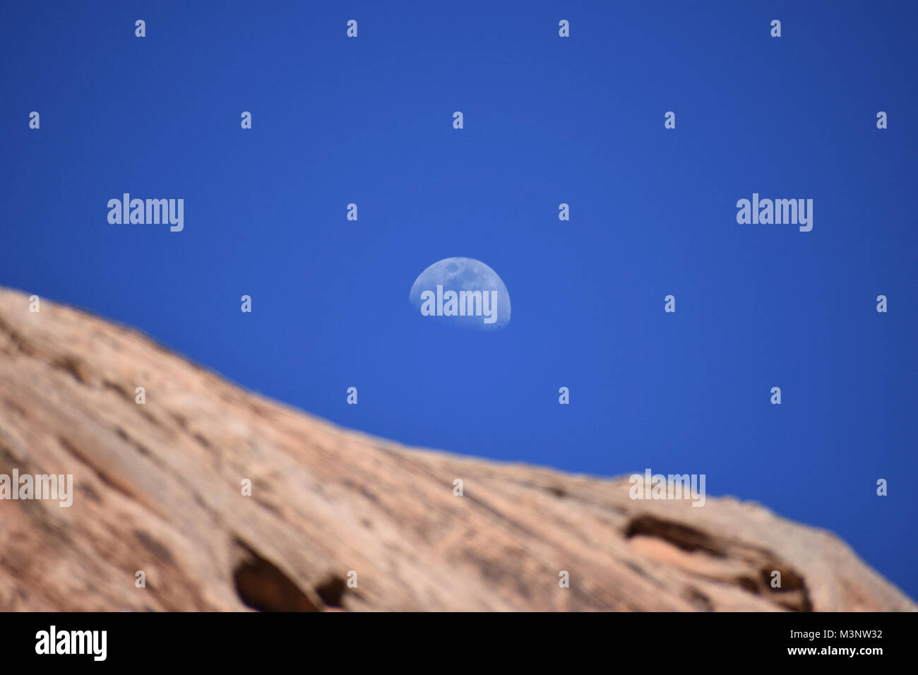 Moon over Arches Stock Photo - Alamy