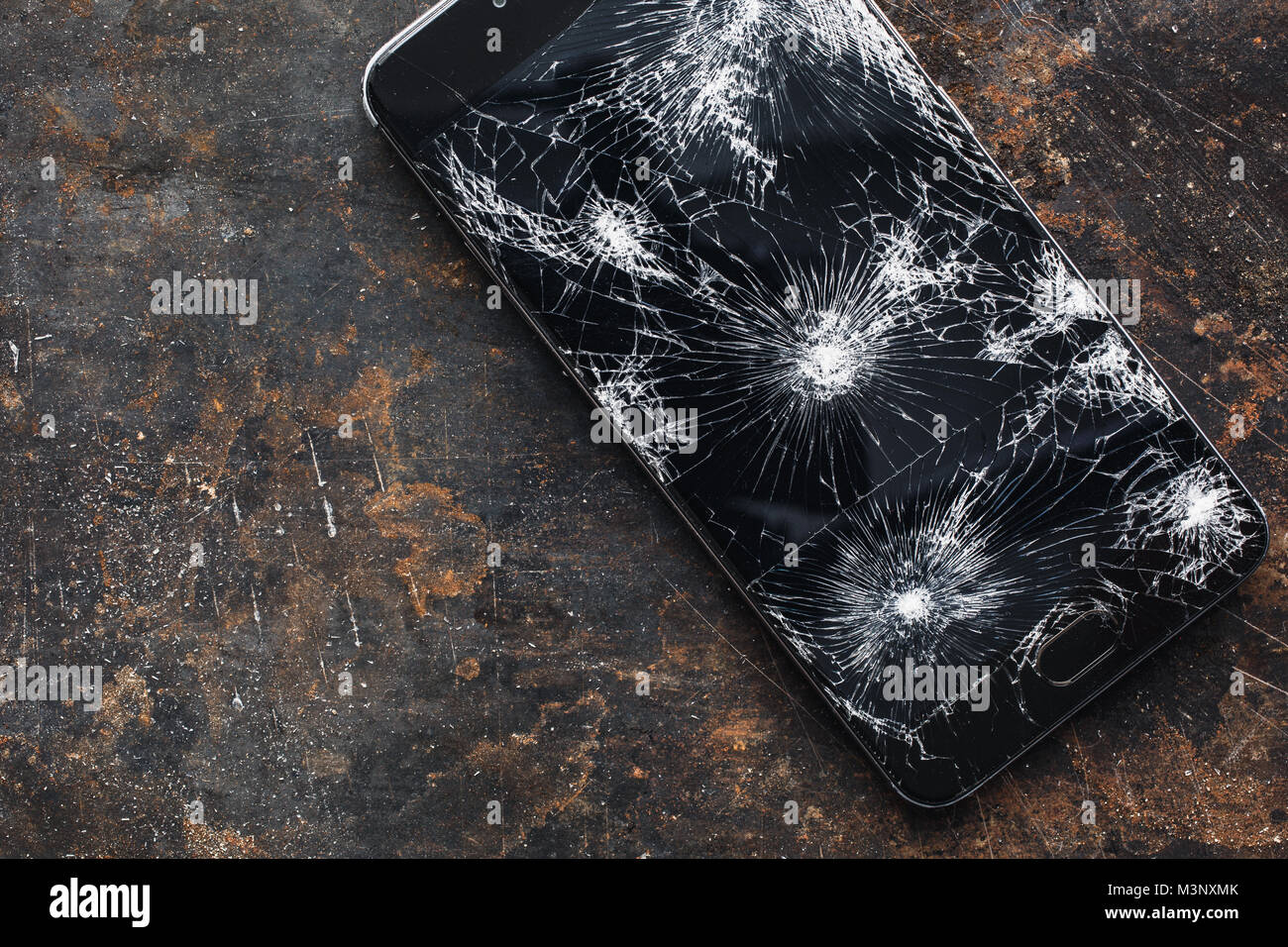 Big modern smartphone with broken screen debris Stock Photo - Alamy