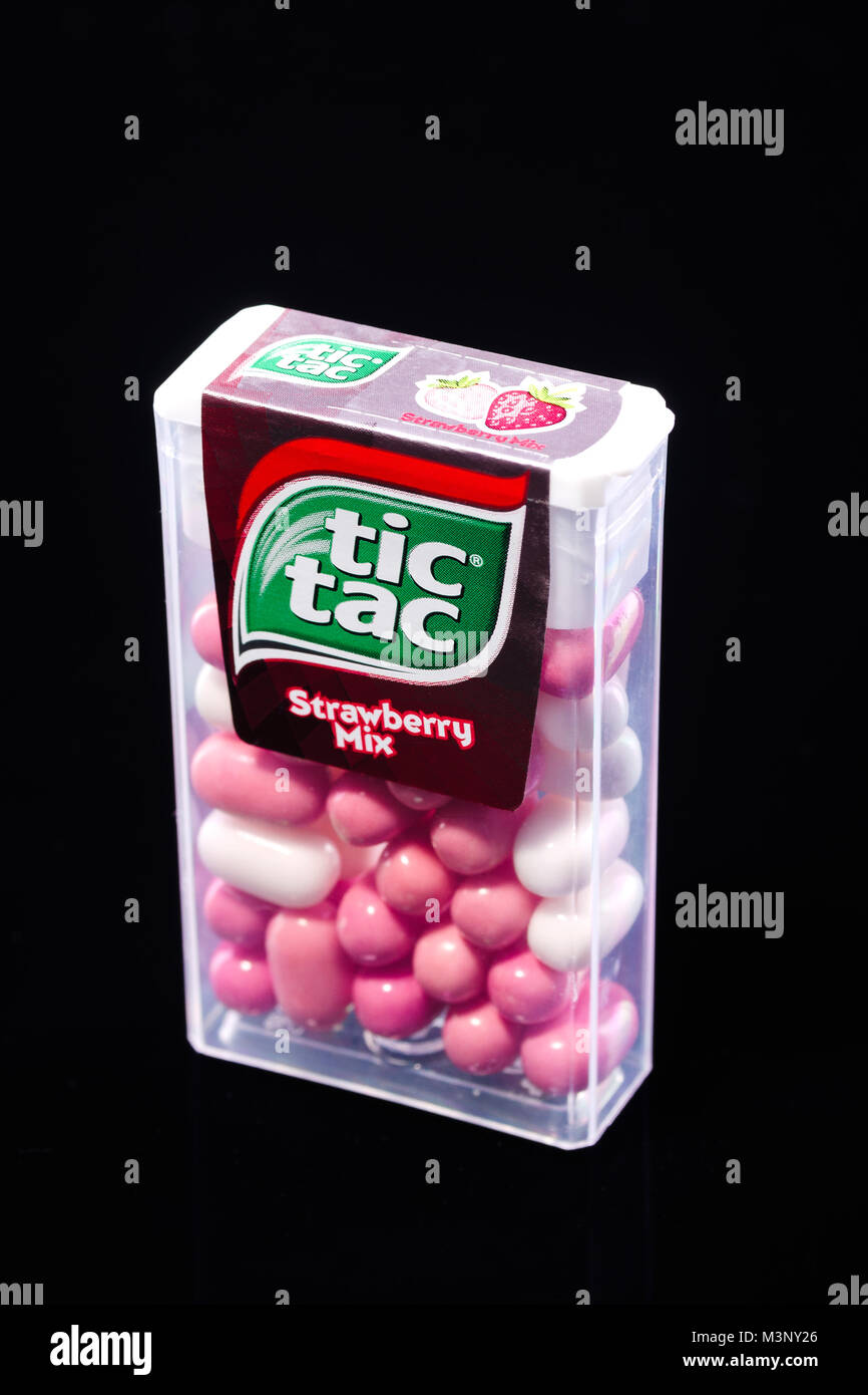 Tic tac drops isolated on dark background Stock Photo - Alamy