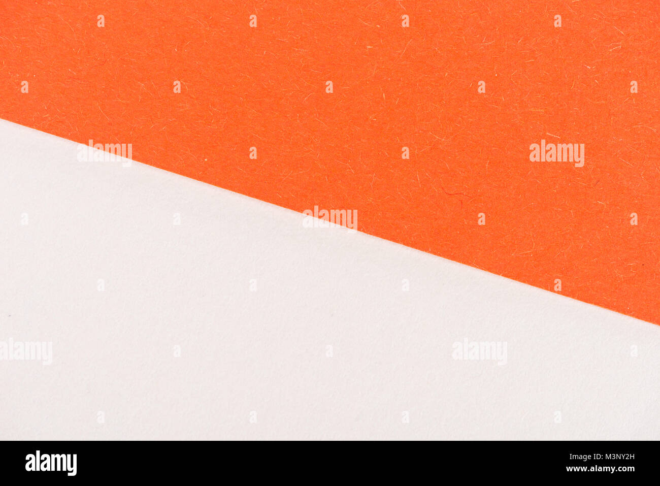 close-up shot of orange and white paper layers for background Stock ...