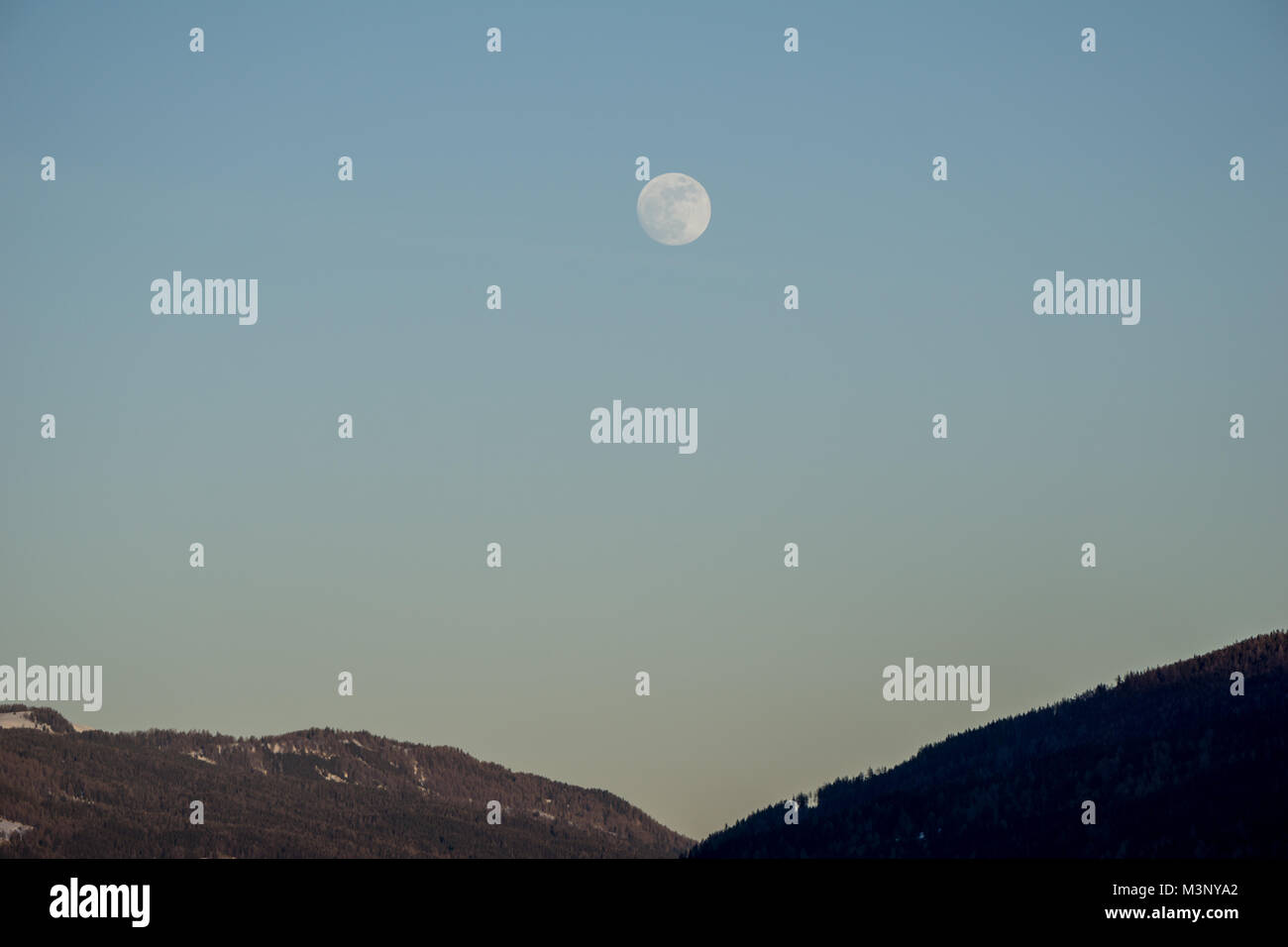 Full moon over snowy mountain hi-res stock photography and images - Alamy