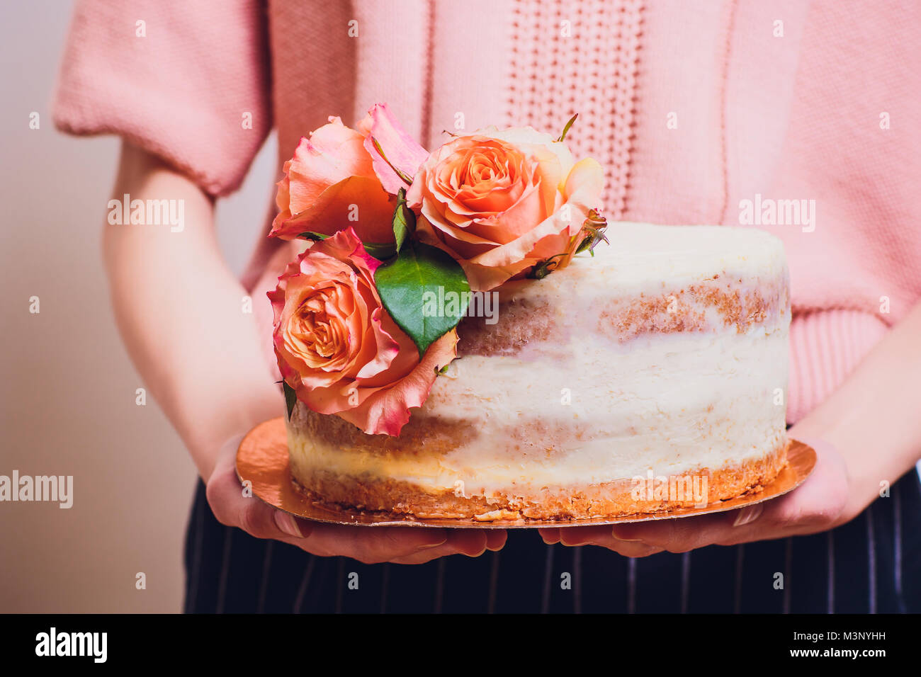 Young woman girl with cake isolated on white Stock Photo - Alamy