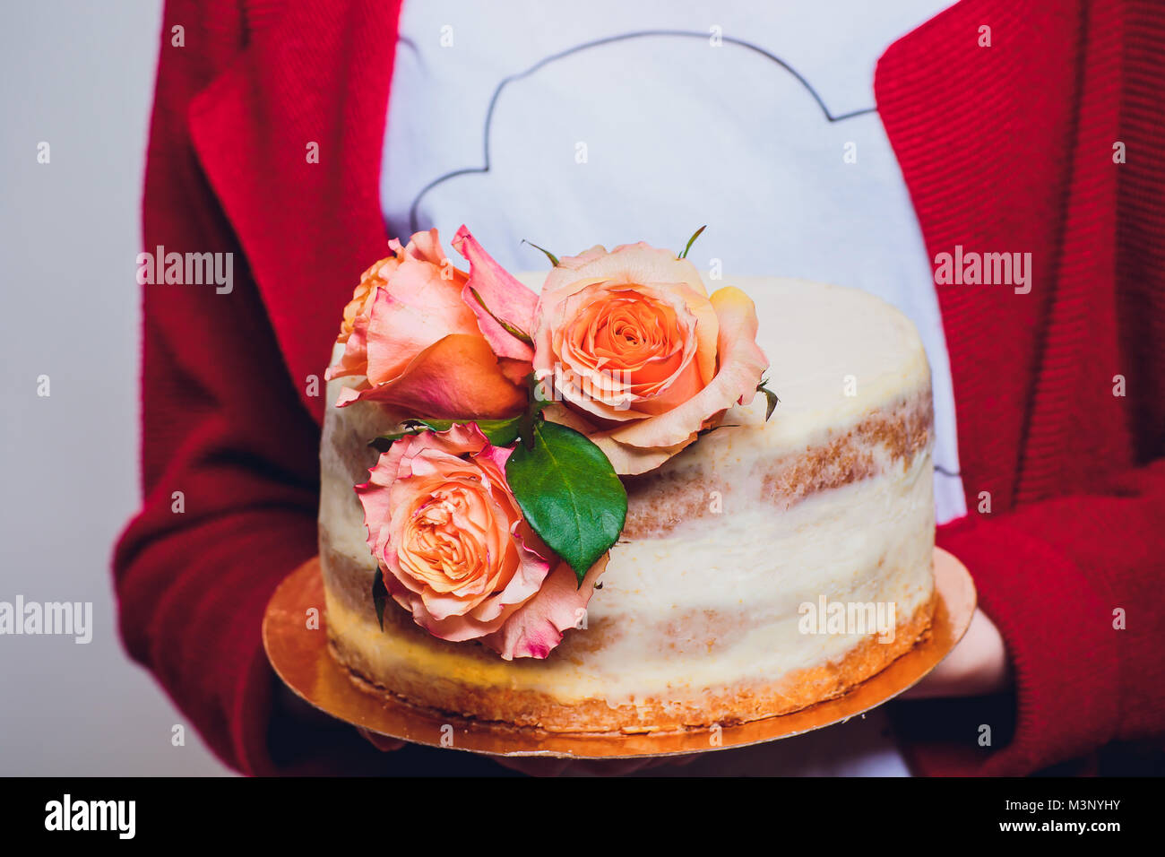 Young woman girl with cake isolated on white Stock Photo - Alamy