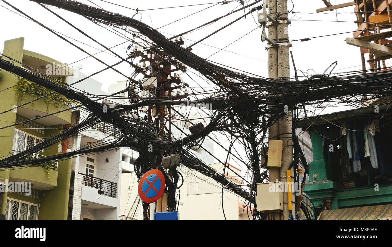The web of power lines on the streets Ho Chi Minh City Stock Photo - Alamy