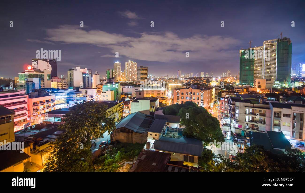 Time lapse view of Makati skyscrapers in Manila city. Skyline at night ...