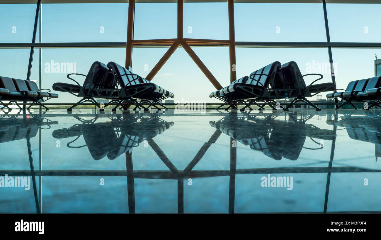 Empty empty airport terminal with passenger seats Stock Photo - Alamy